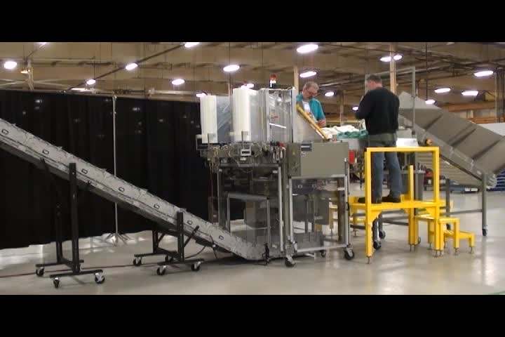 Laundry Bagger Systems | Vertical Laundry Bagging Equipment Sealing ...